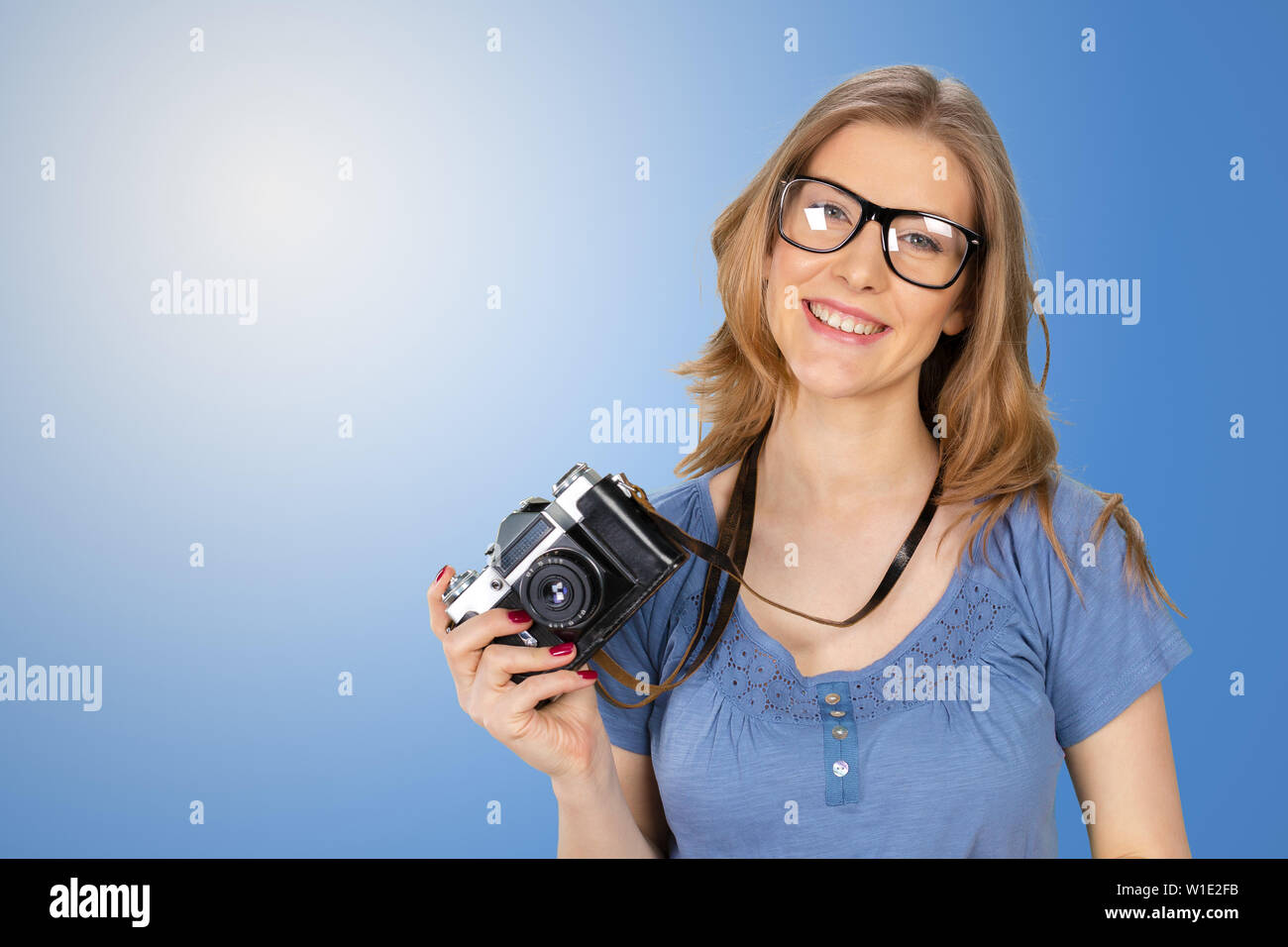 Woman photographer with camera Stock Photo - Alamy
