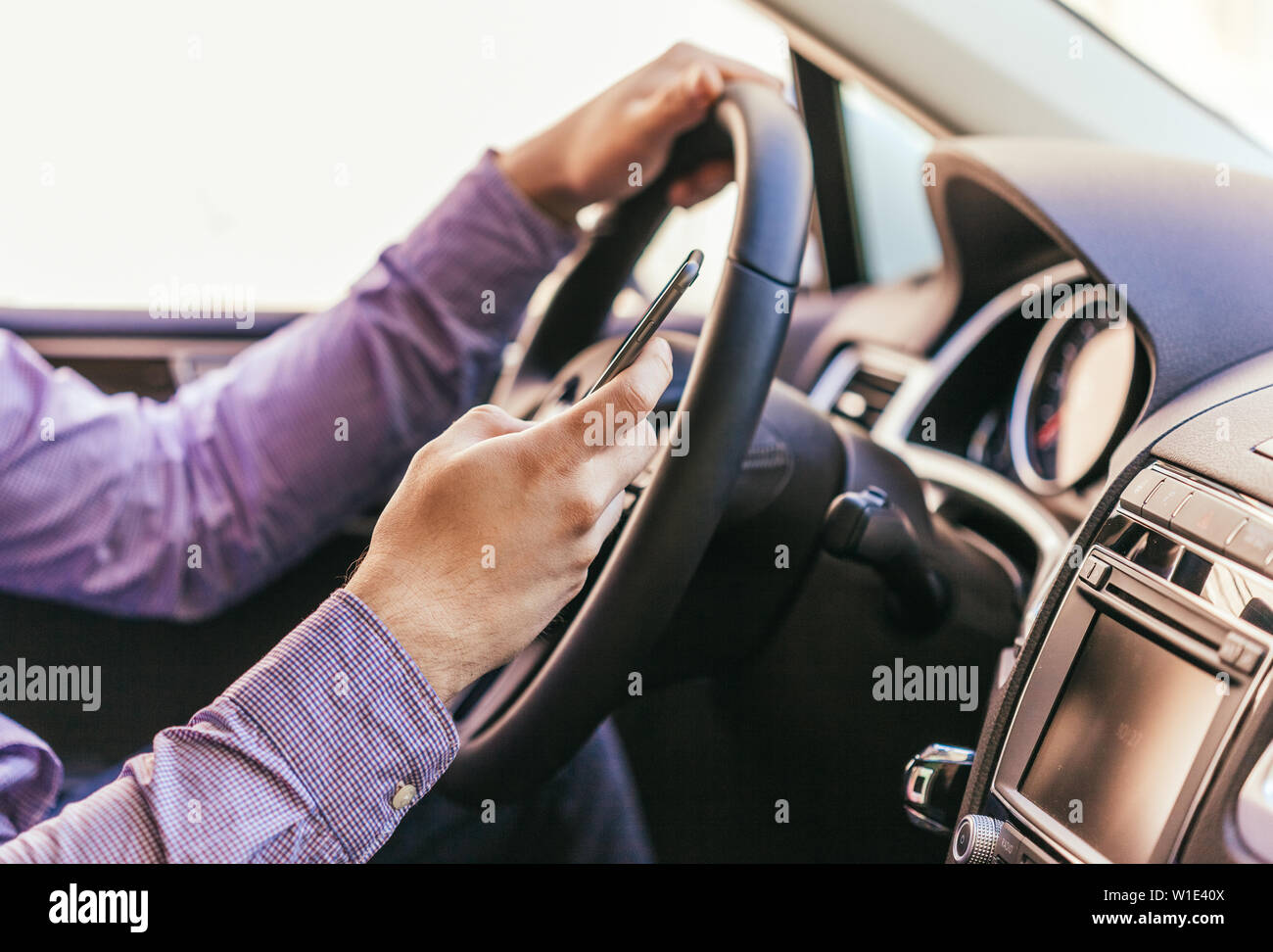 Close-up of a male hand in a modern car Stock Photo - Alamy