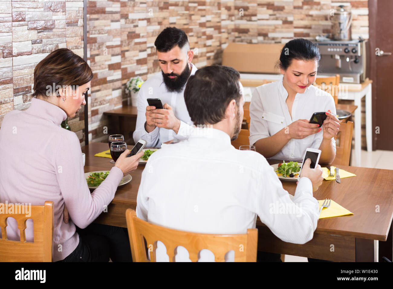 Restaurant cafe phone ignoring hi-res stock photography and images - Alamy