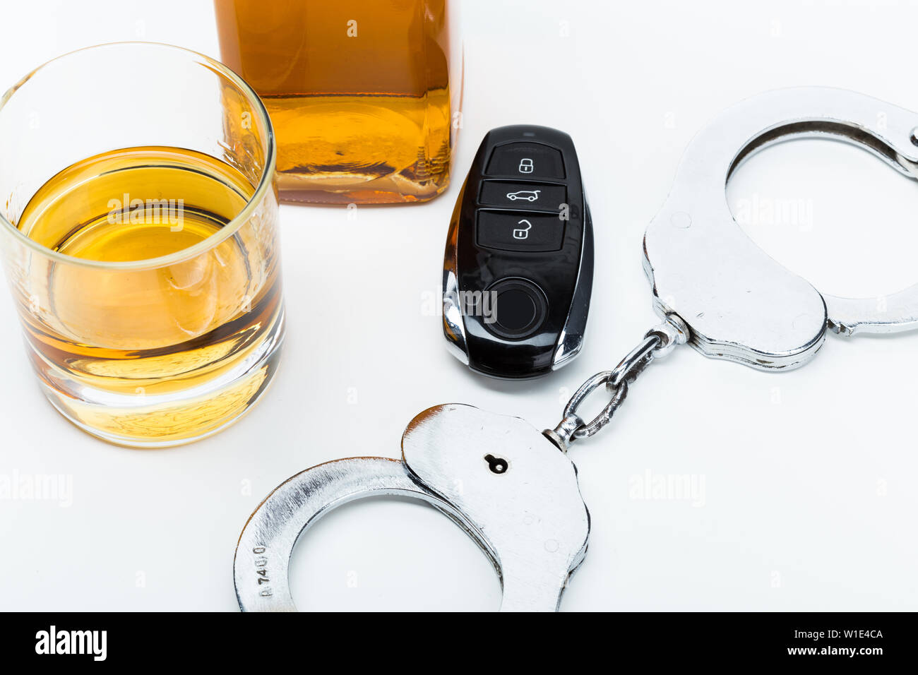 Car key on the bar with spilled alcohol Stock Photo - Alamy