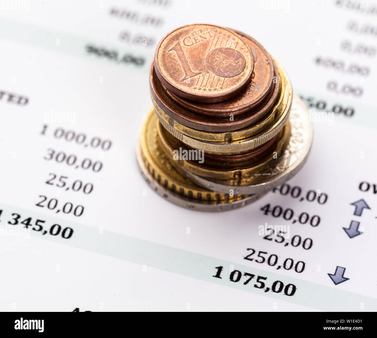 Graph Of Stock Market With Stacks Of Coins Stock Photo - Alamy
