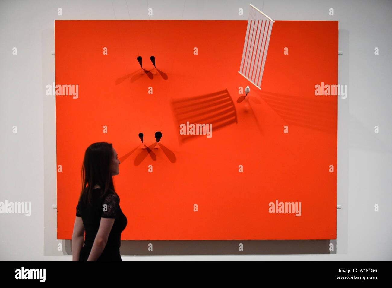 London, UK. 2 June 2019. A staff member views "Magnetic Wall 9 (Red ...