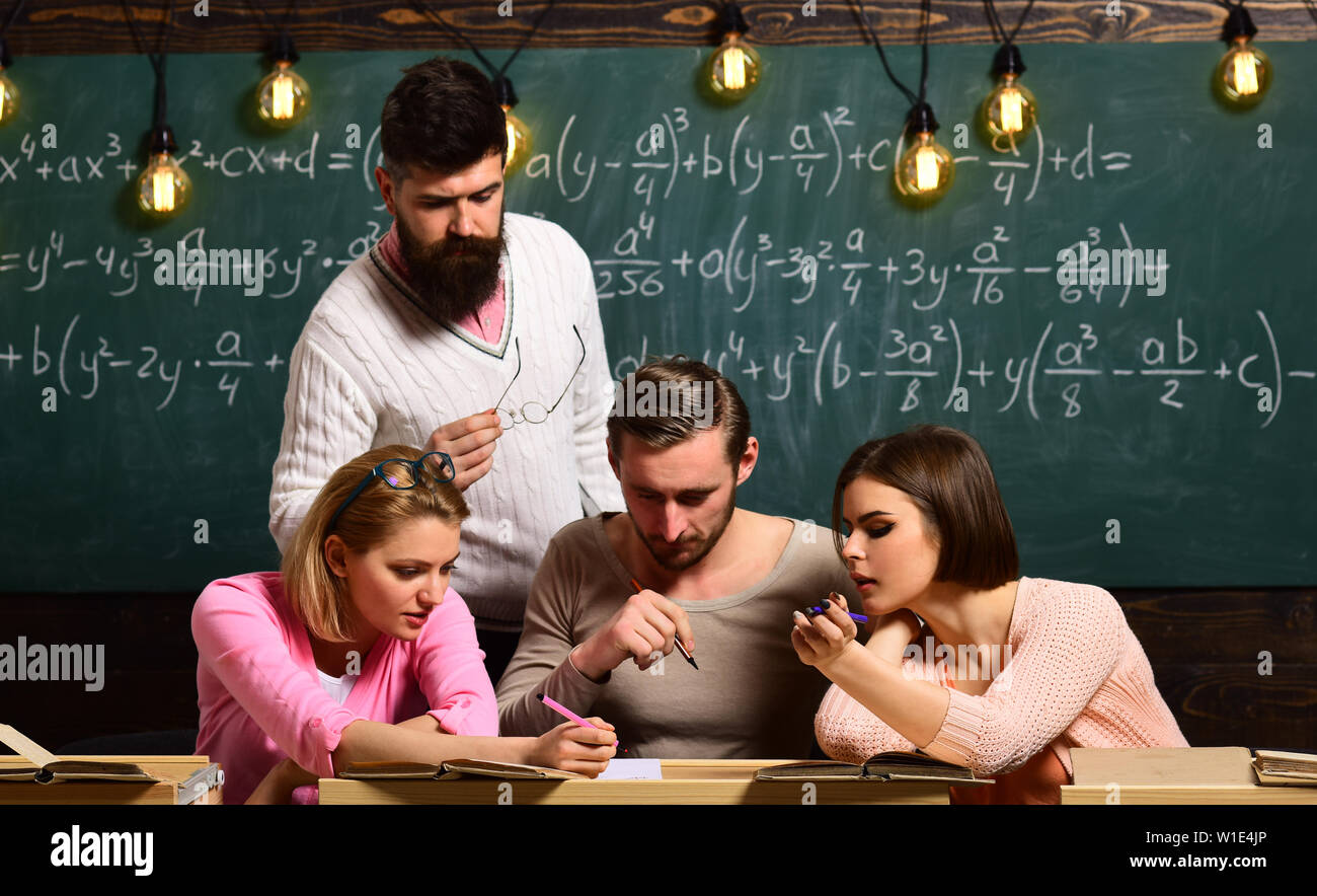 teamwork. teamwork of students working together in school classroom ...