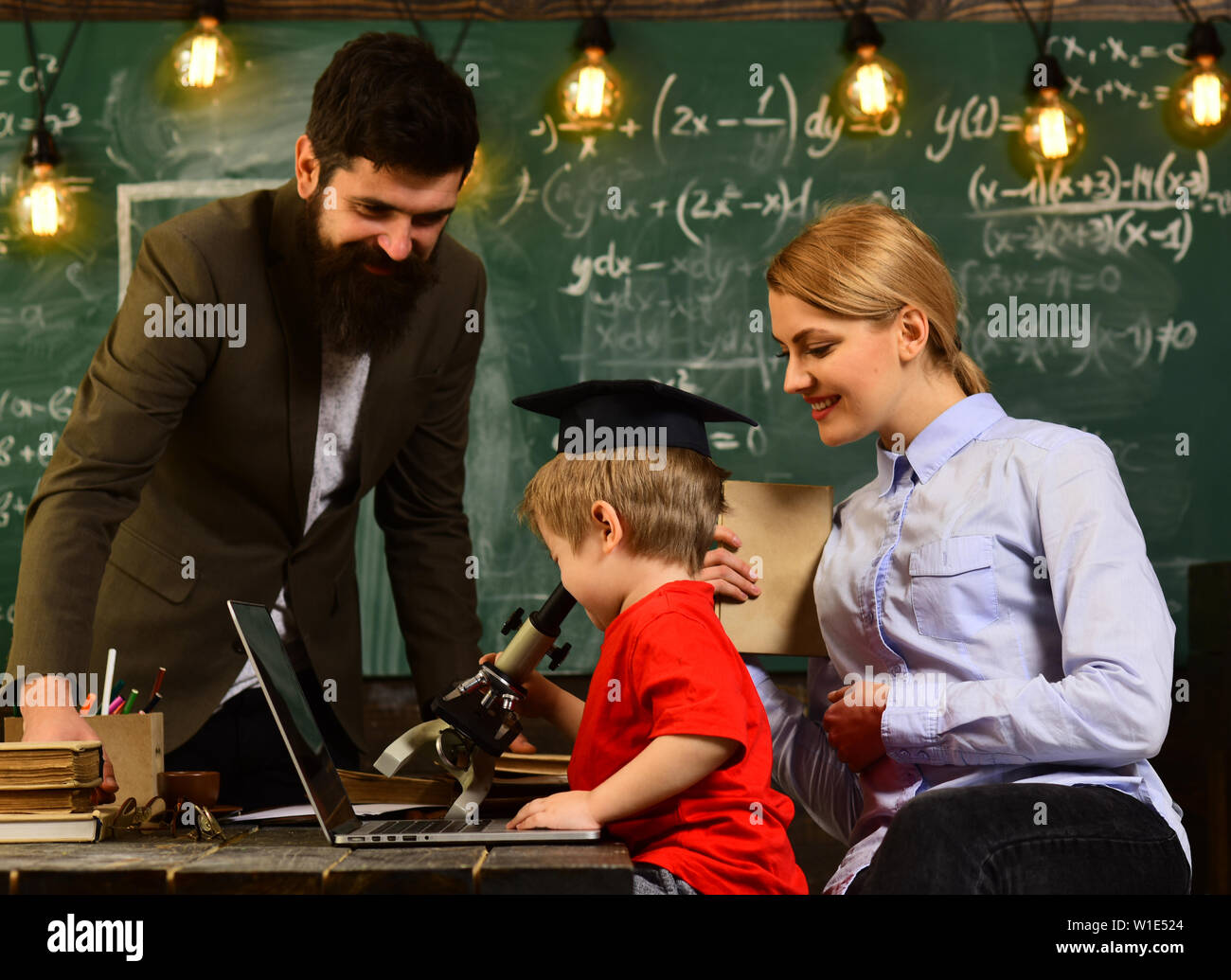 Teacher collaborates with colleagues, Hipster is solving math exam ...