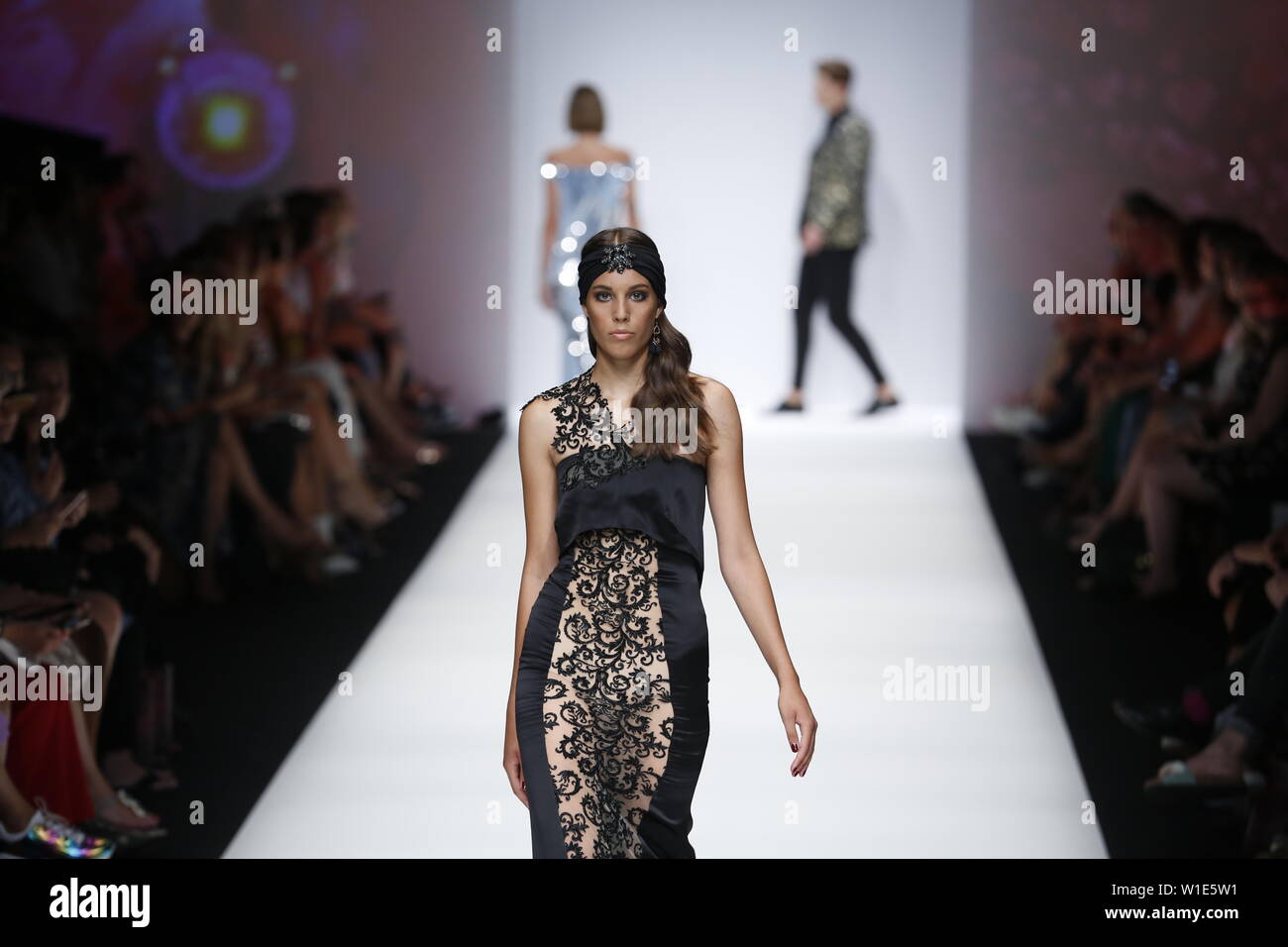 Berlin, Germany. 01st July, 2019. The photo shows models on the catwalk with the collections ...