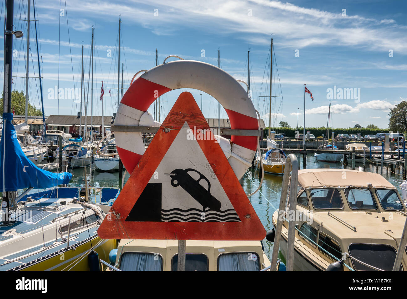 Warning sign watch out harbor Stock Photo - Alamy