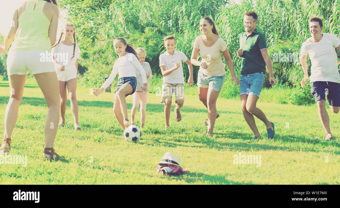 Father kids playing football together hi-res stock photography and ...