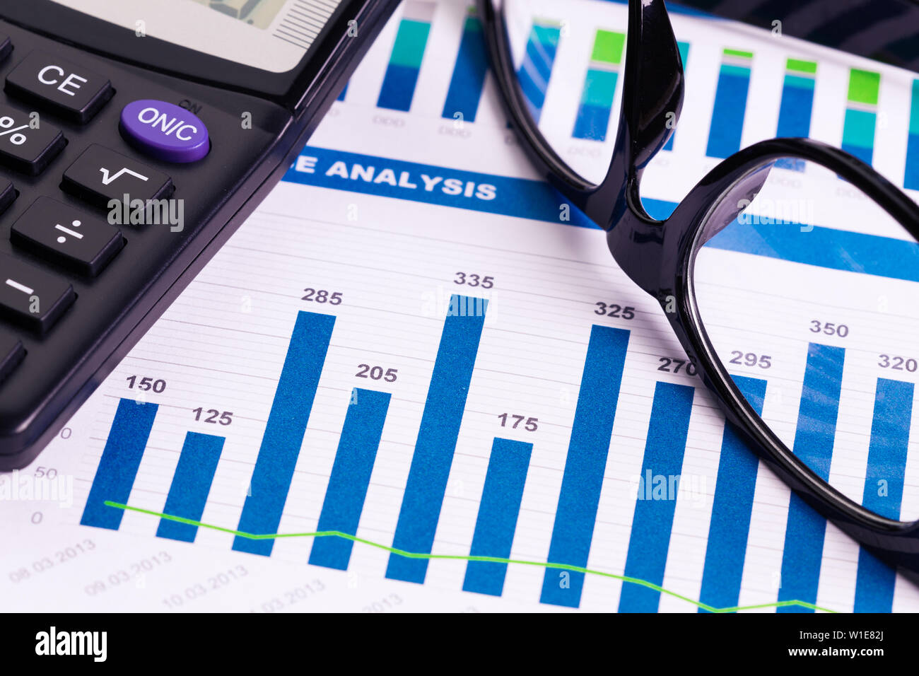 Graphs and Calculator Stock Photo - Alamy