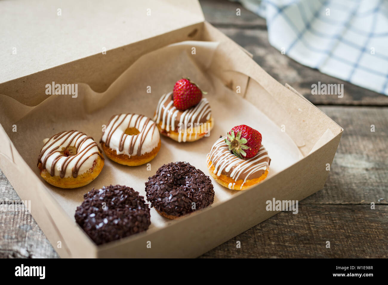 Colorful donuts in box Stock Photo - Alamy