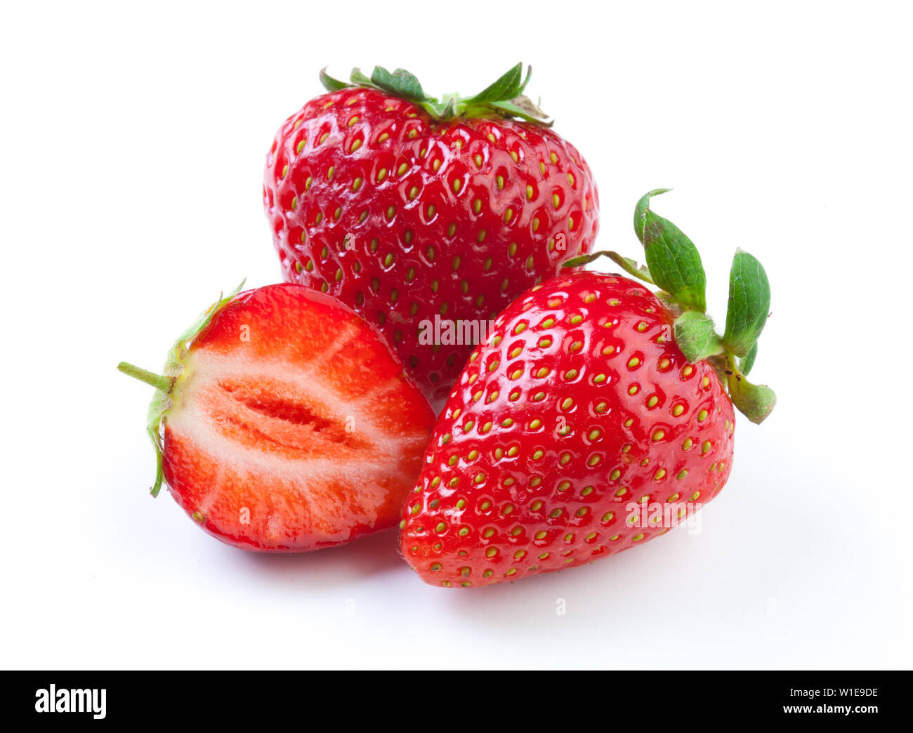 Beautiful strawberries isolated on white Stock Photo - Alamy