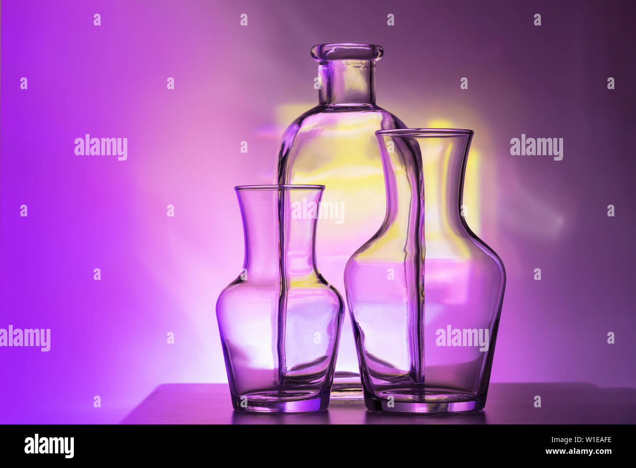 glass transparent tableware - bottles of different sizes, three pieces ...