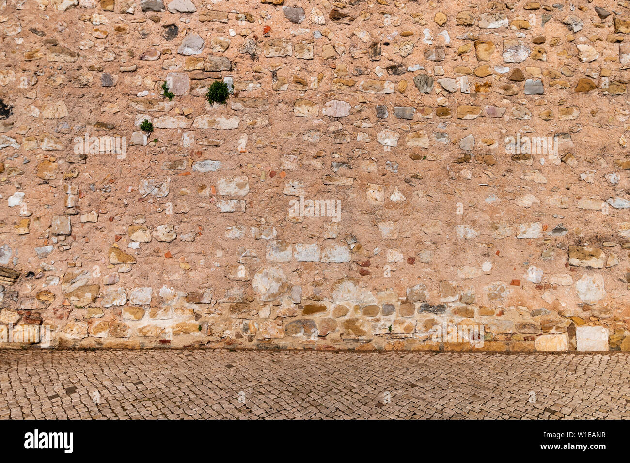 Close up view of an old and ancient medieval wall of a castle ...