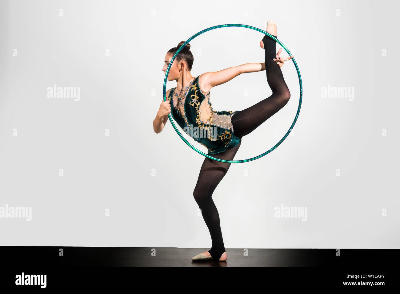 sports activities in gym of flexible girl. sport activity of woman in ...