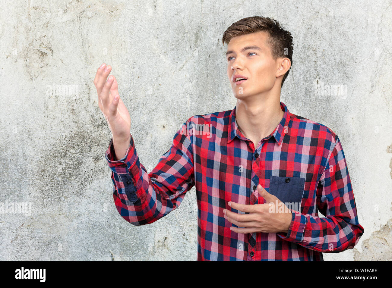 Young man singing Stock Photo - Alamy