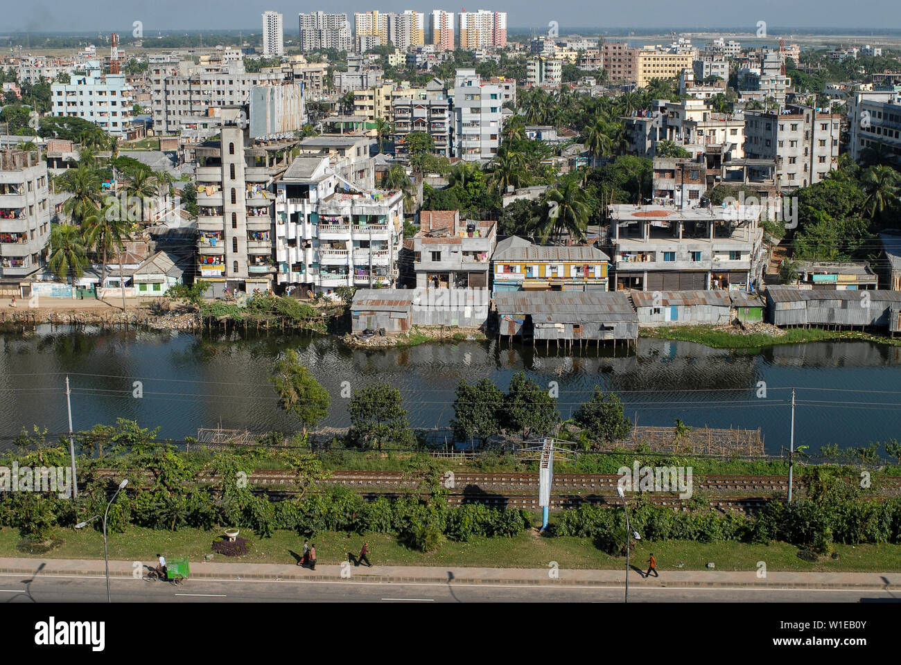 BANGLADESH, Dhaka city, view on river and suburb with apartment block ...