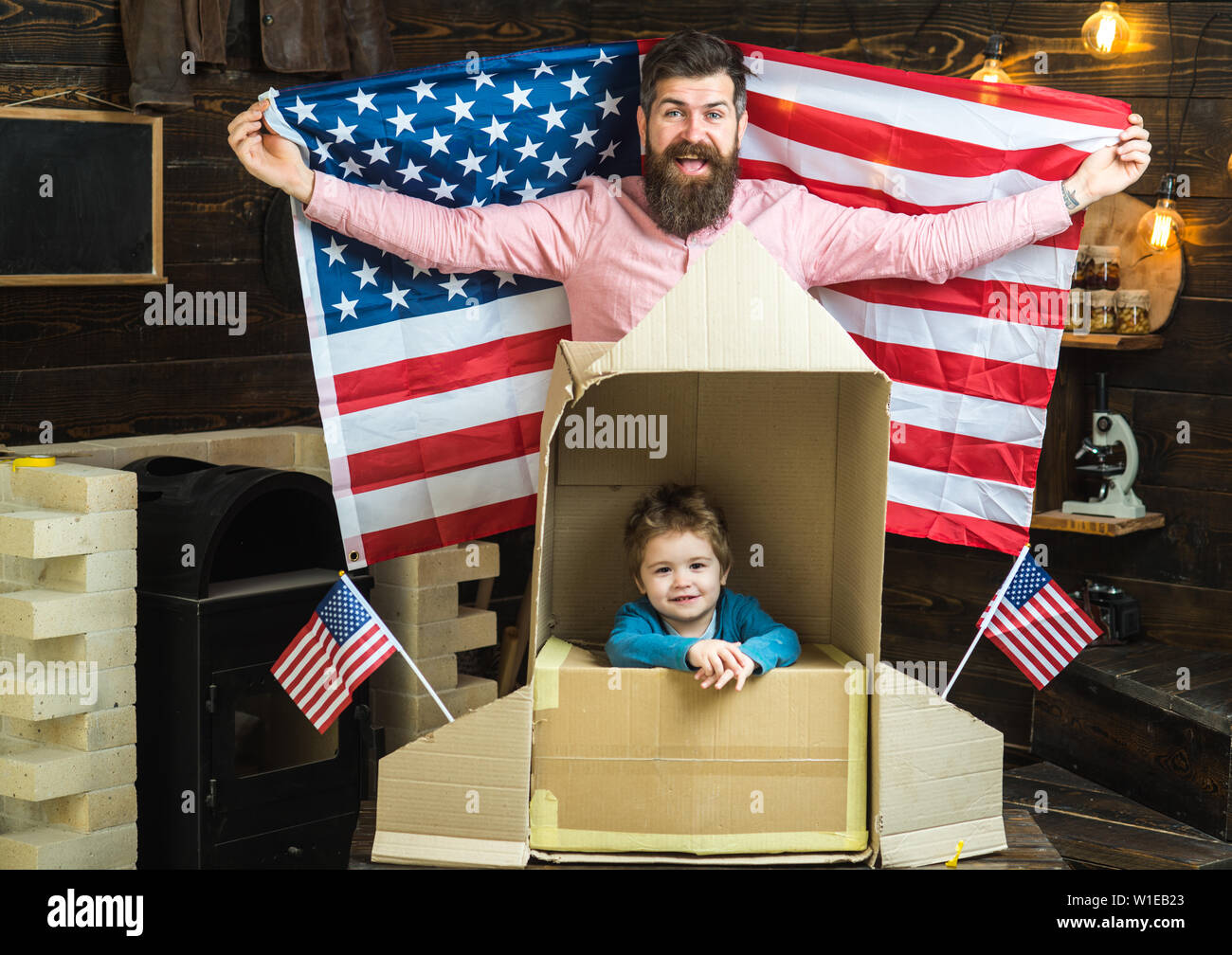 modern american family with USA flag and paper rocket Stock Photo - Alamy