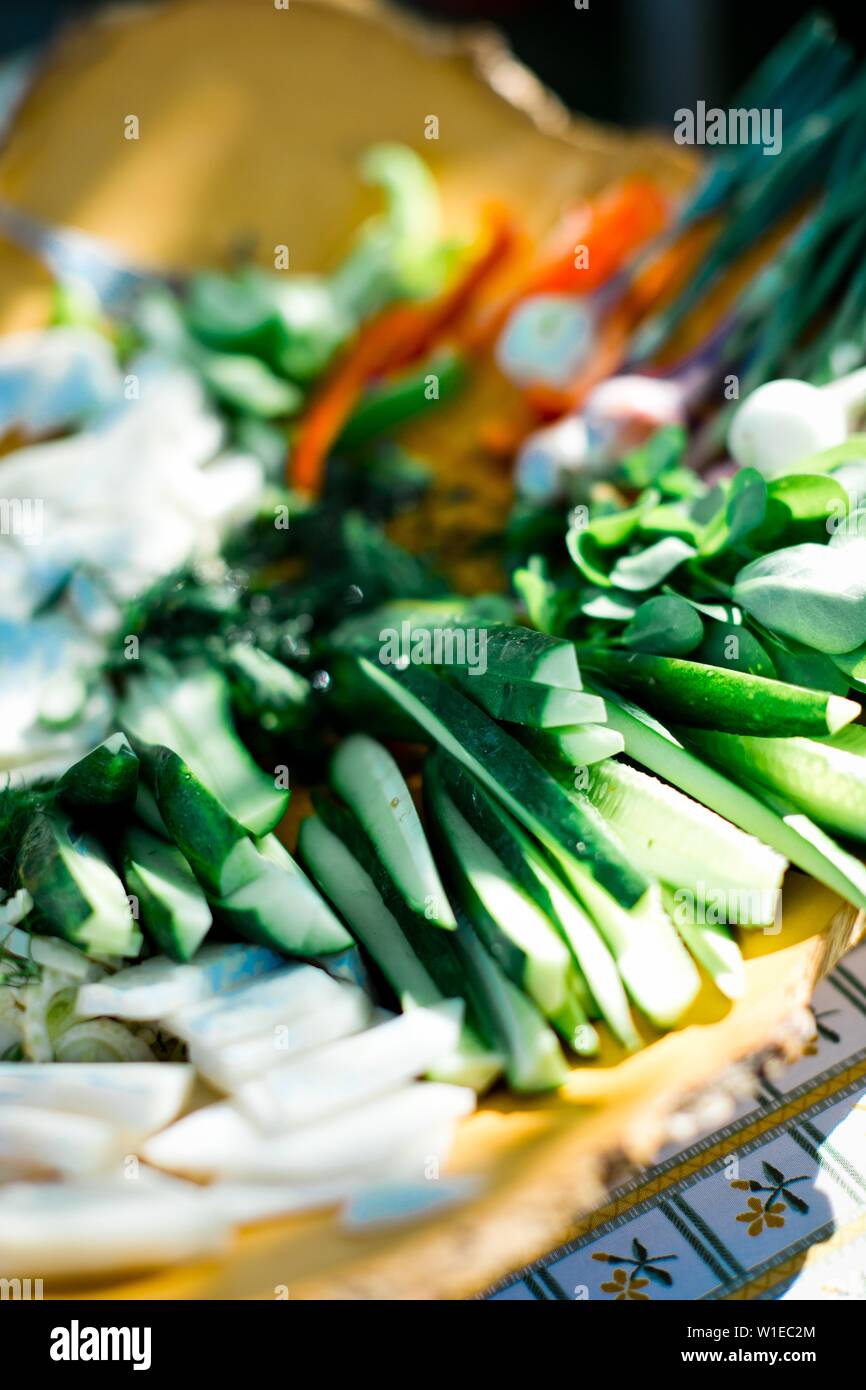 Fresh vegetable plate with sliced bio garden products Stock Photo - Alamy