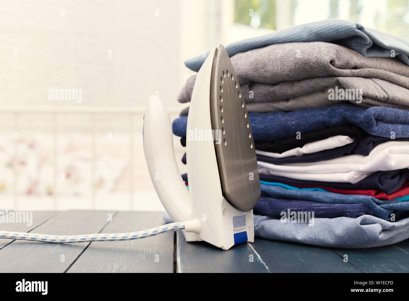 Stack of clothes Stock Photo - Alamy