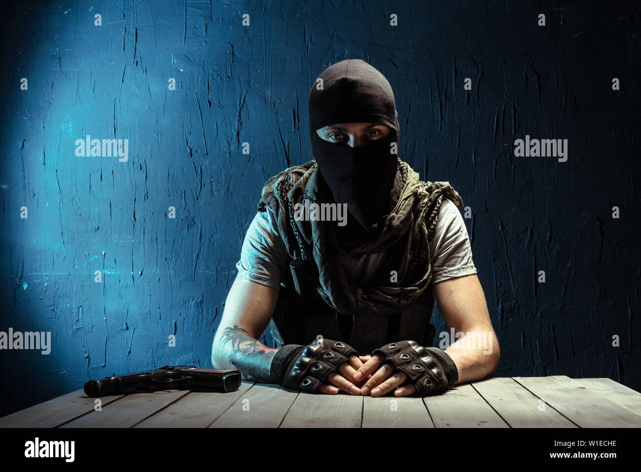Terrorist in a mask Stock Photo - Alamy