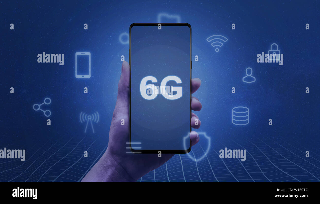 6G mobile network concept. Smart phone in woman hand with 6G on the ...