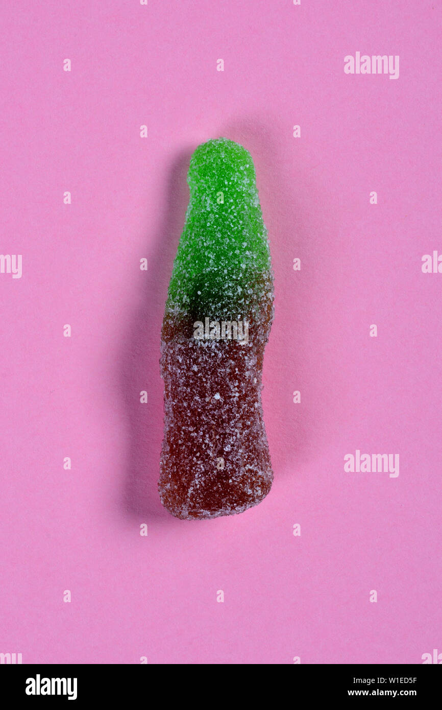 bottle coke candy on pink background Stock Photo - Alamy
