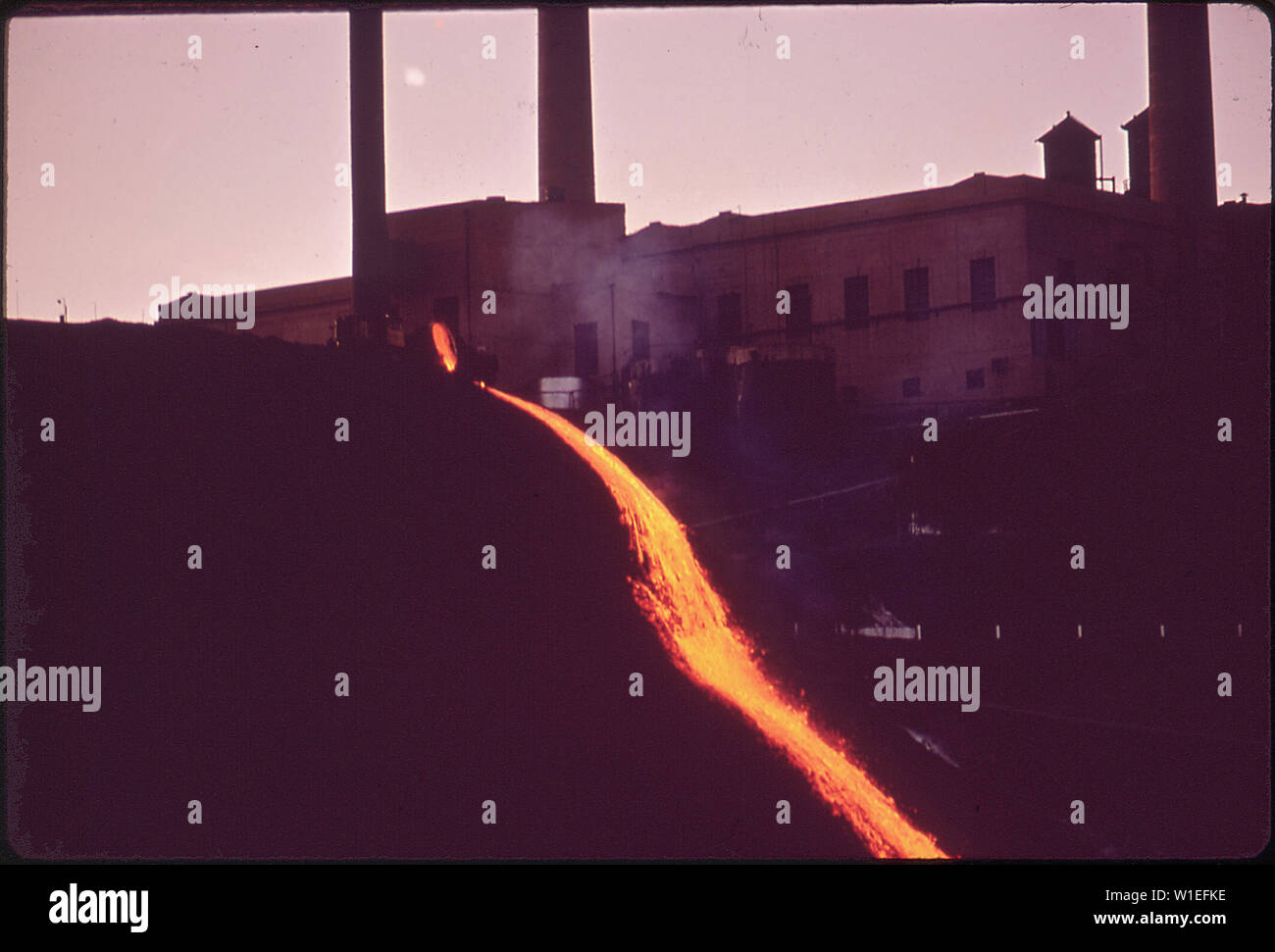 HOT SLAG POURS FROM SMELTER OF INSPIRATION CONSOLIDATED COPPER COMPANY ...