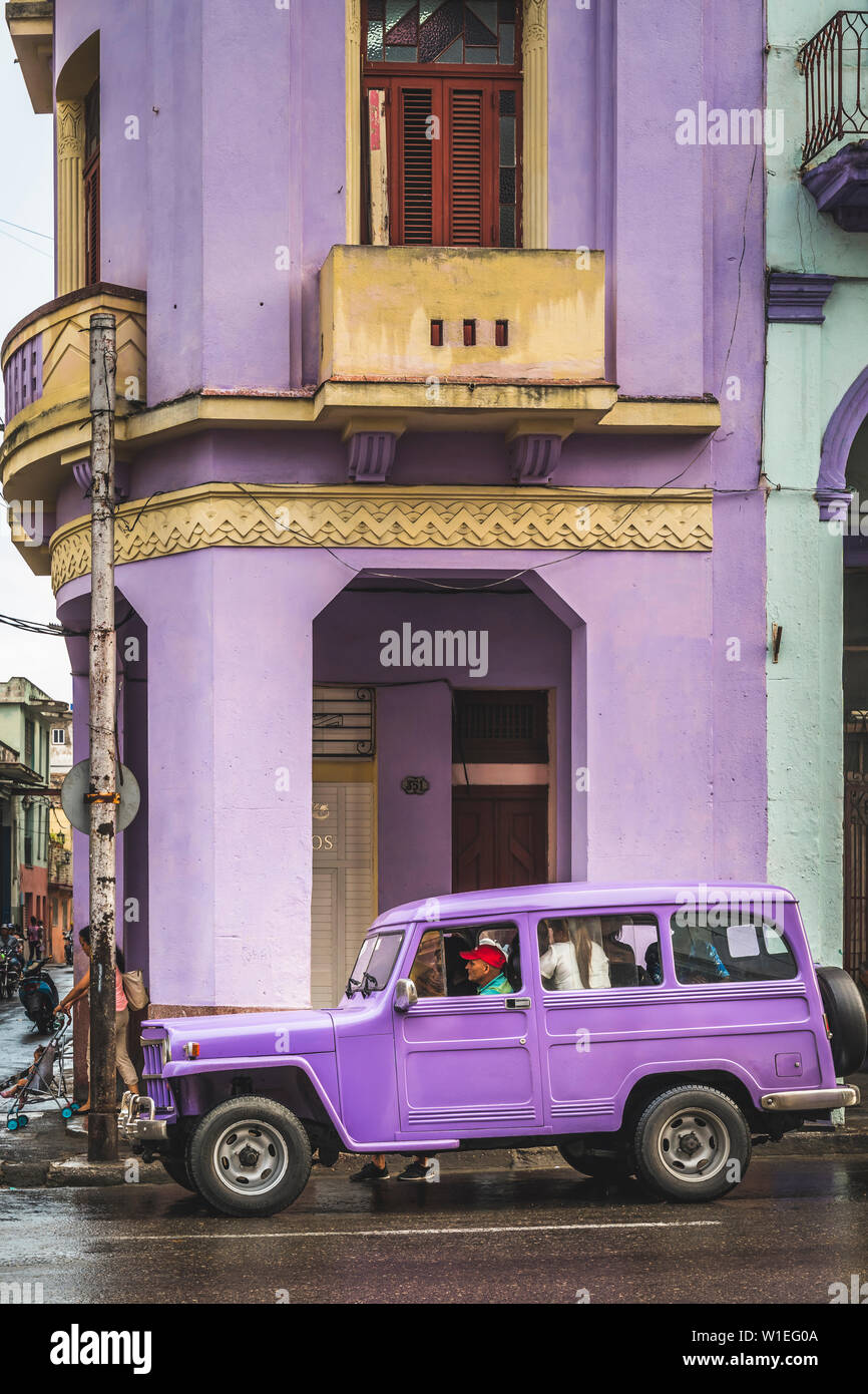 Pink building and pink vintage car in La Habana (Havana), Cuba, West ...