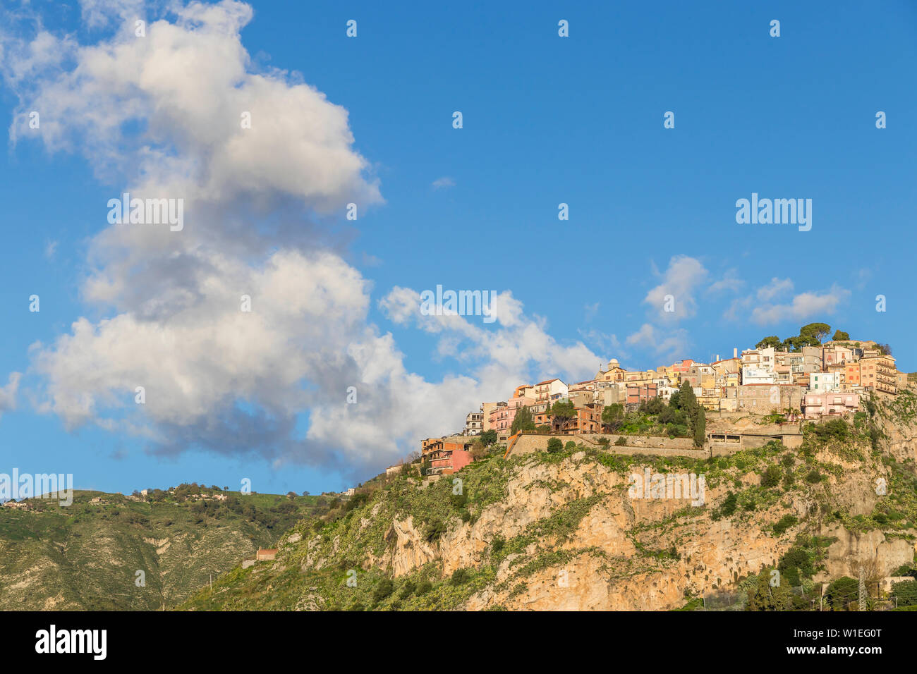 View from Madonna della Rocca church to the village of Castelmola ...