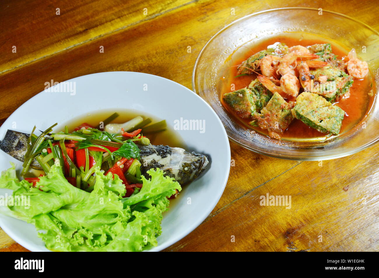 steamed goby with soy sauce and fried egg in spicy soup Stock Photo - Alamy