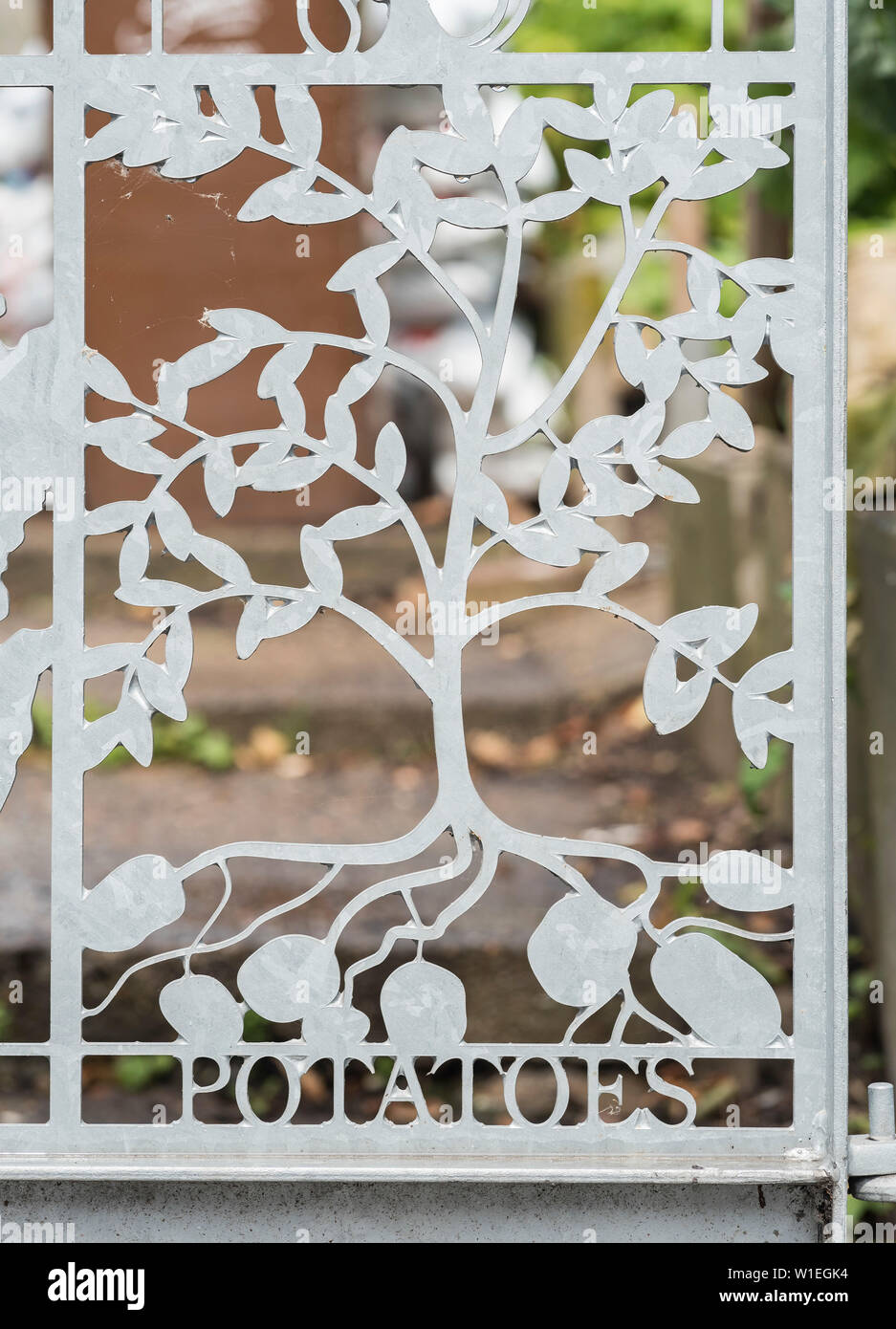 Galvanised steel panels of a gate, cut on a CNC form an appropriate ...