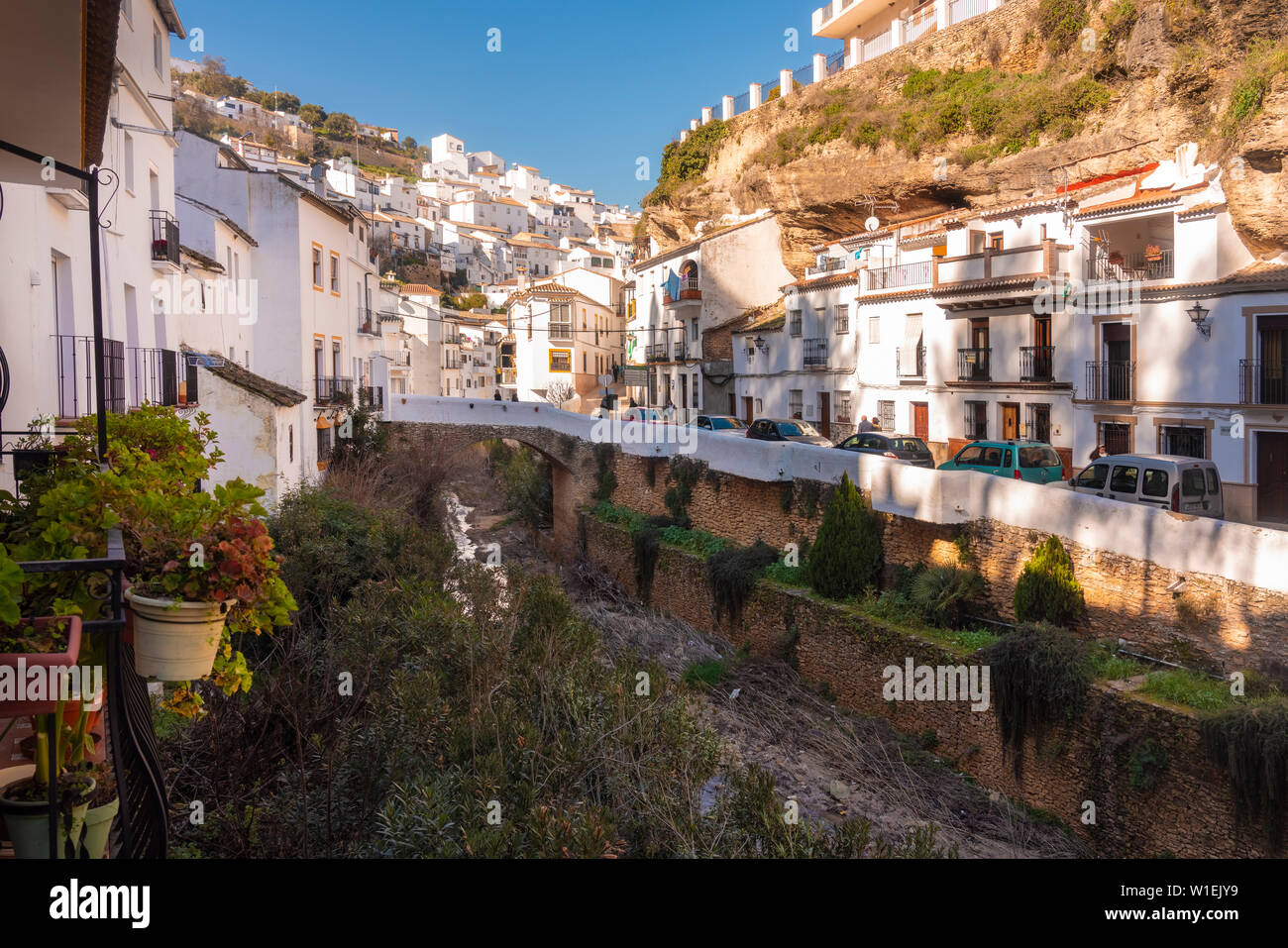 Setenil de las Bodegas with its white historic buildings and the houses ...