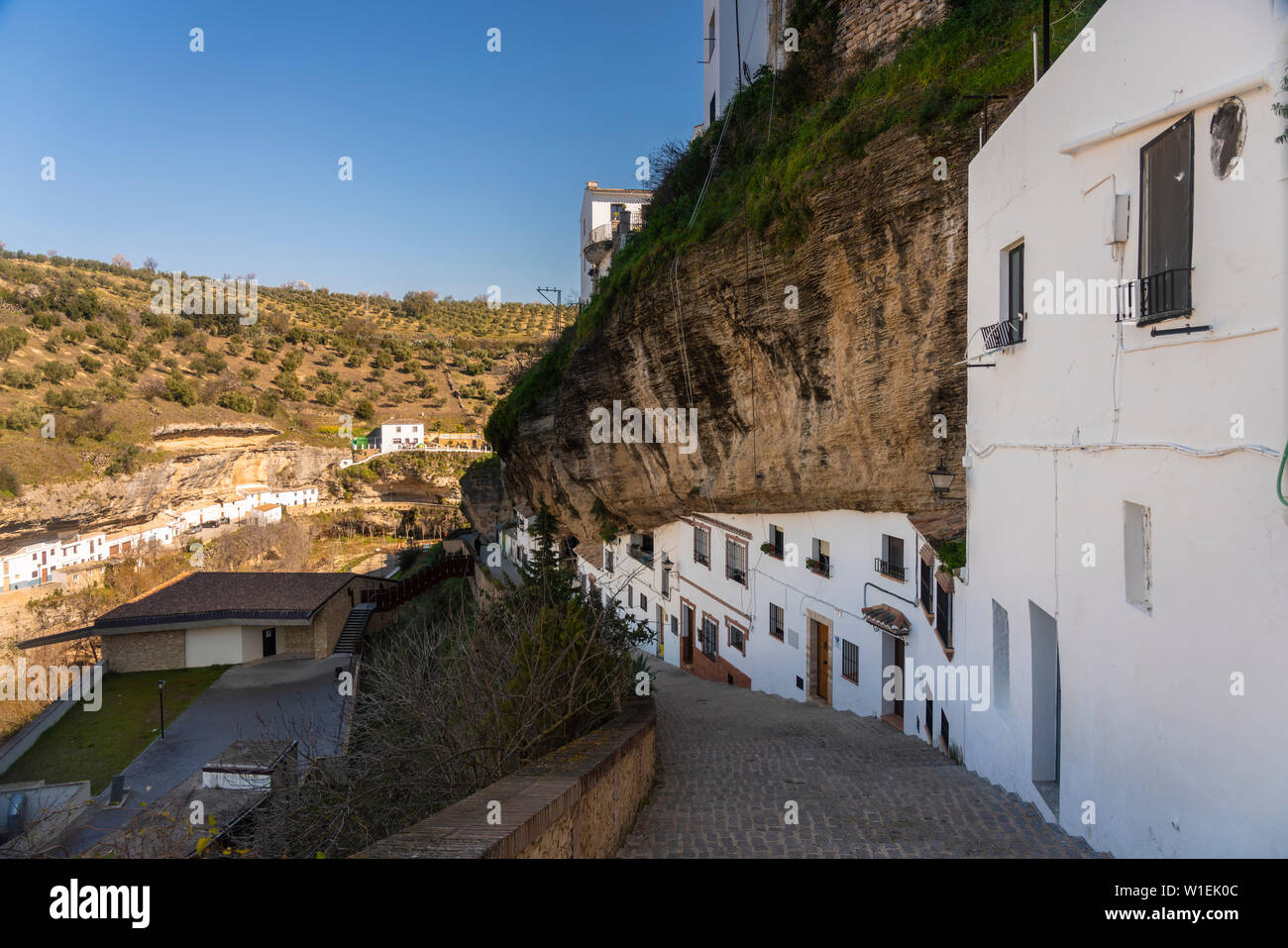 Setenil de las Bodegas with its white historic buildings and the houses ...