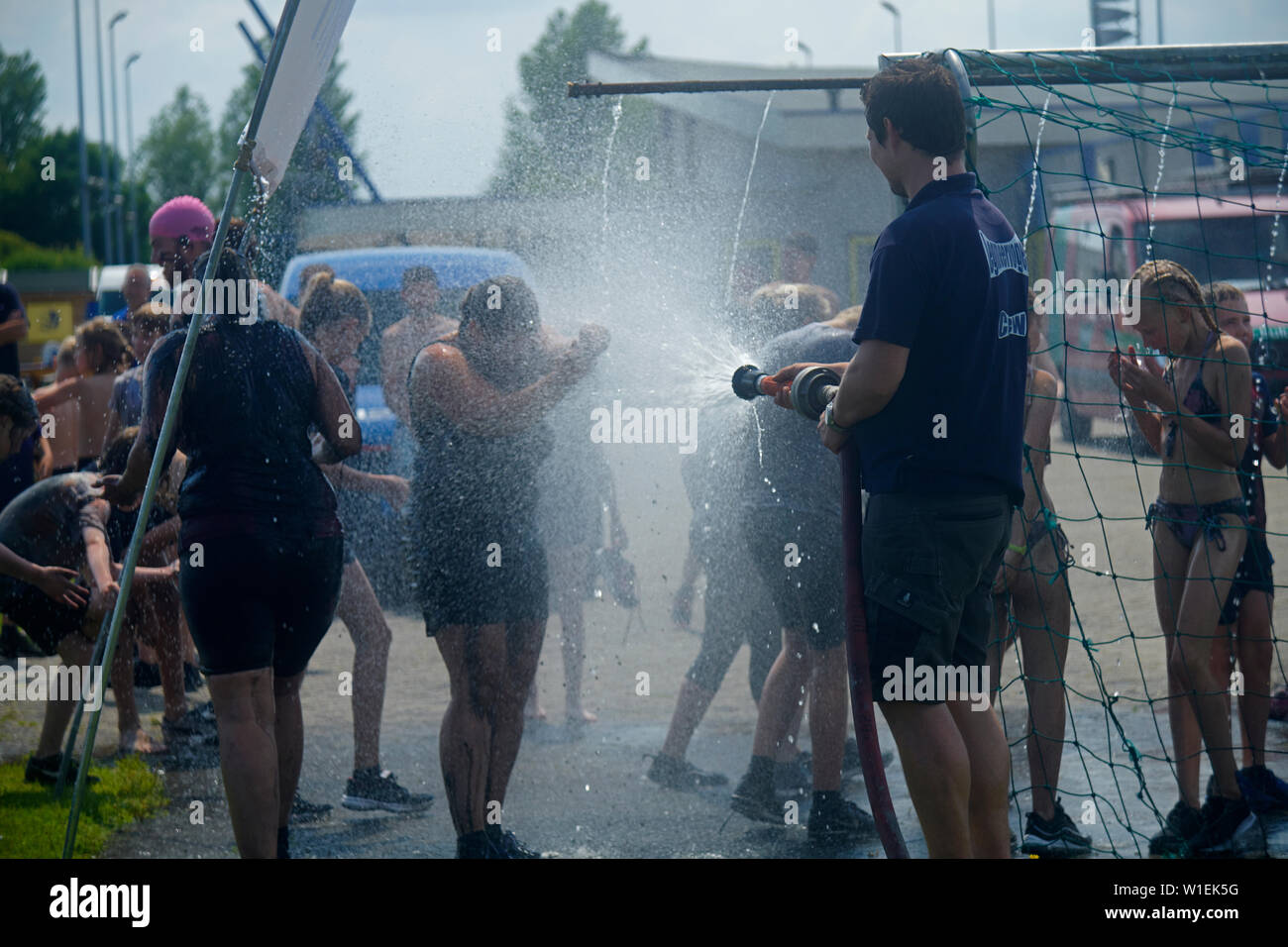 Being Hosed Down High Resolution Stock Photography and Images - Alamy
