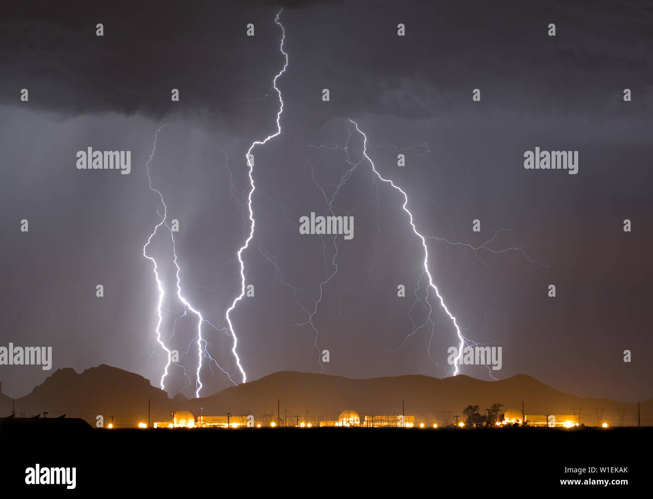 A large lightning storm behind a nuclear power plant in western Arizona ...