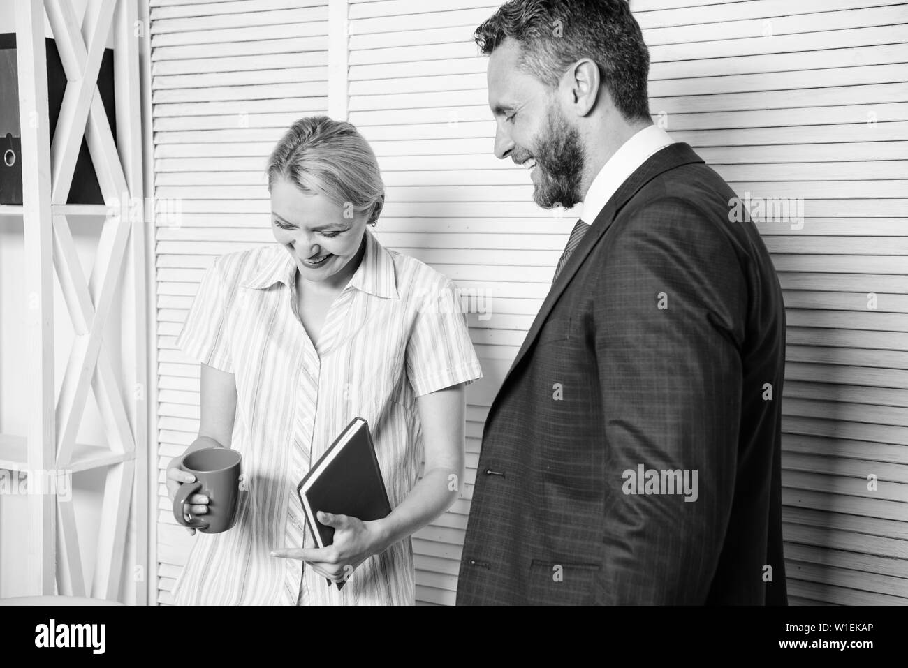 Boss and worker discuss business. Relations at workplace. Colleagues ...