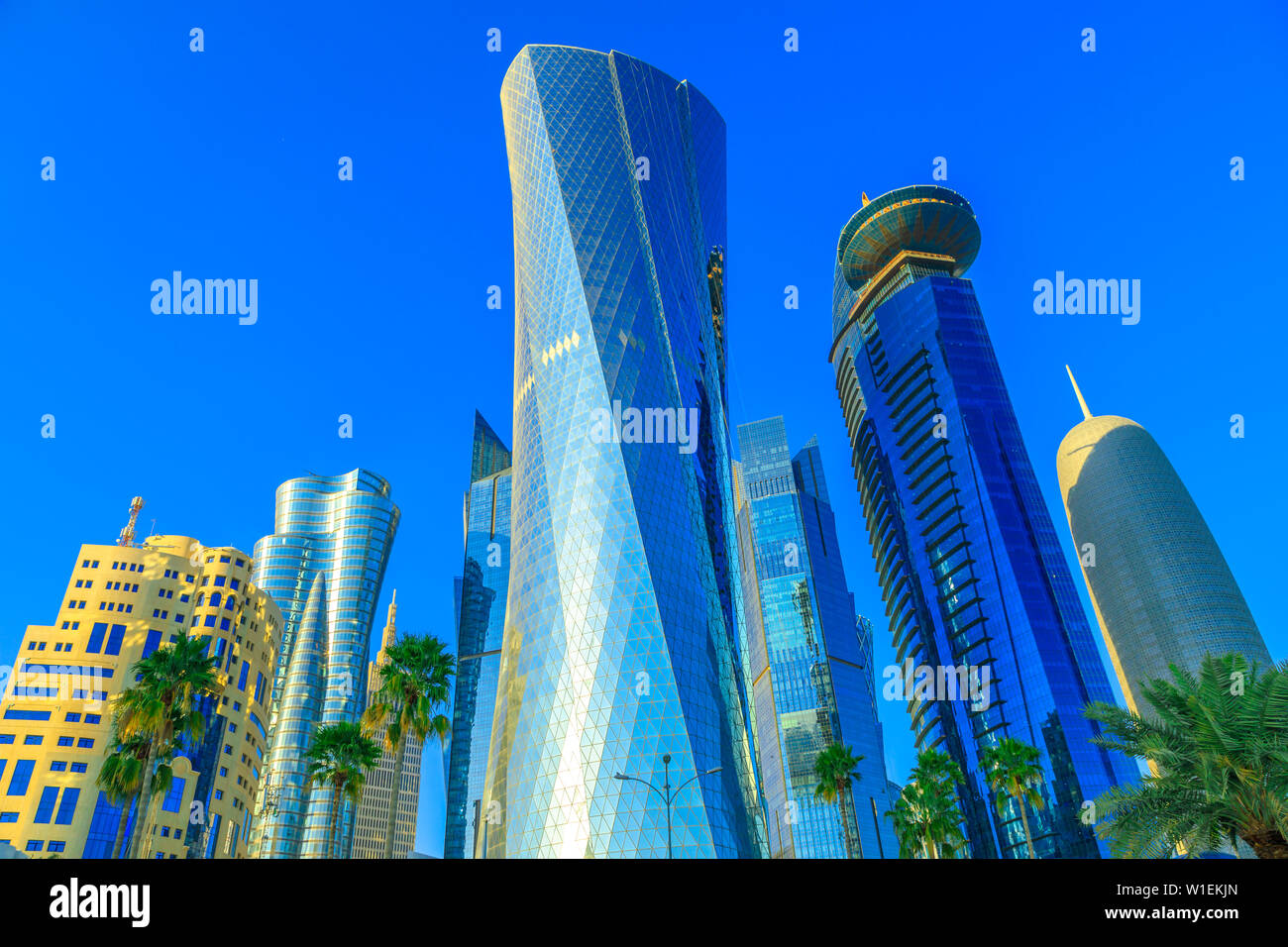 Low angle view of Al Fardan Towers complex and Doha Tower, iconic ...