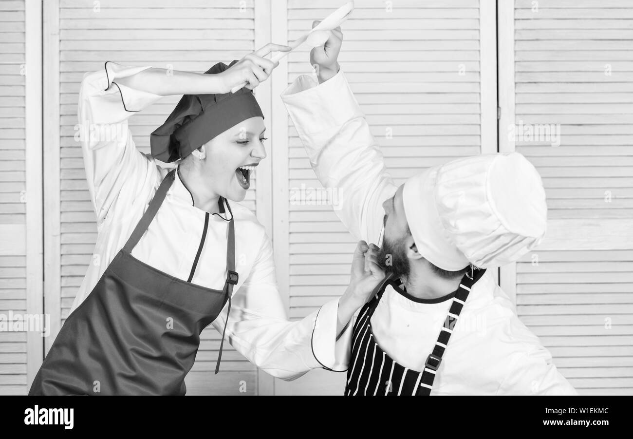 Culinary battle of two chefs. Couple compete in culinary arts. Kitchen ...