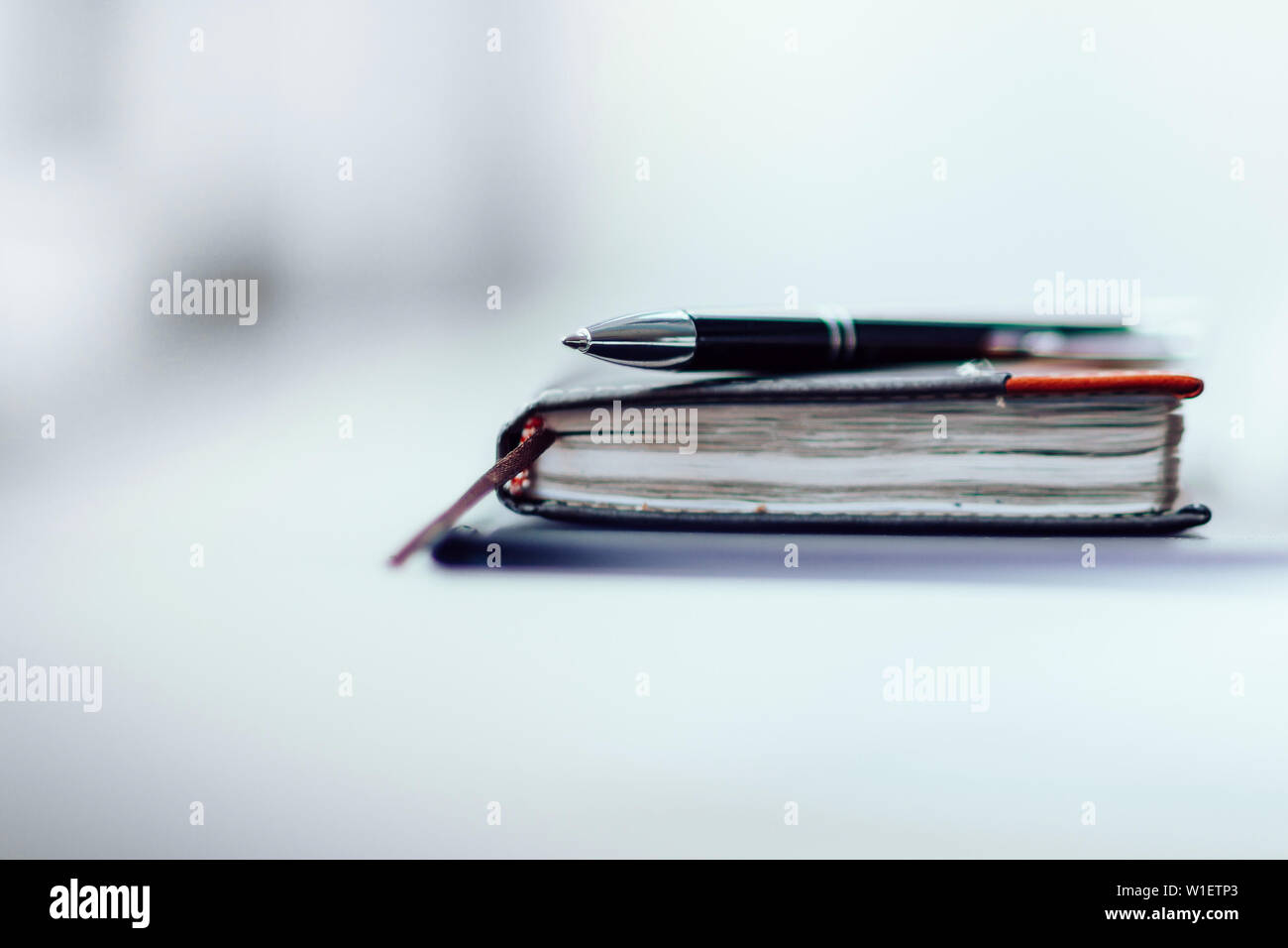 Notepad and pen on office Desk background . business concept Stock ...