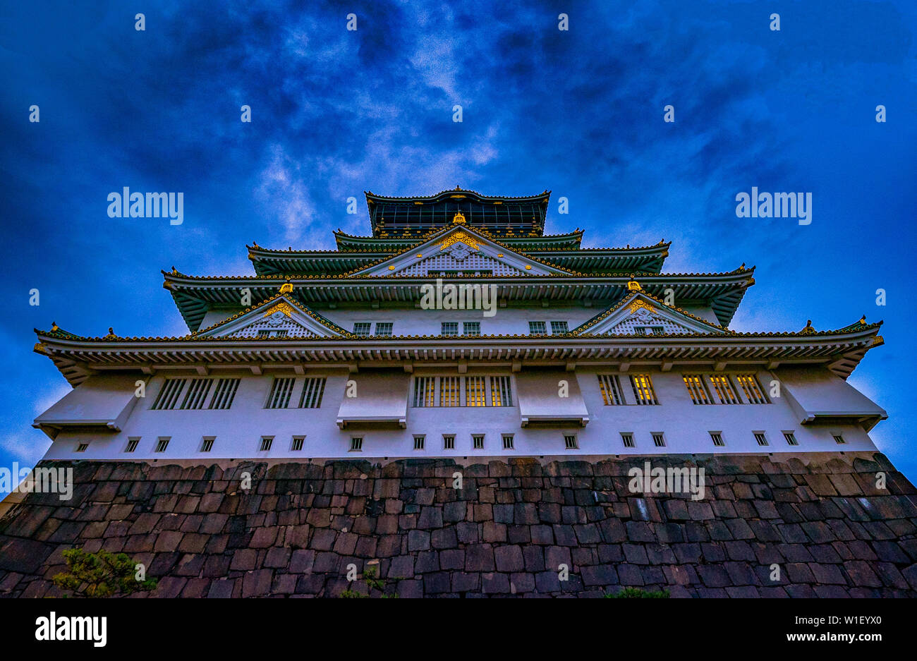 Osaka castle during rain Stock Photo - Alamy
