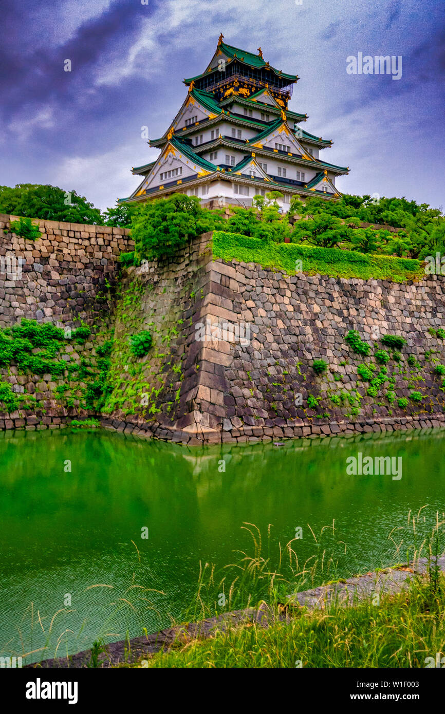 Osaka castle during rain Stock Photo - Alamy
