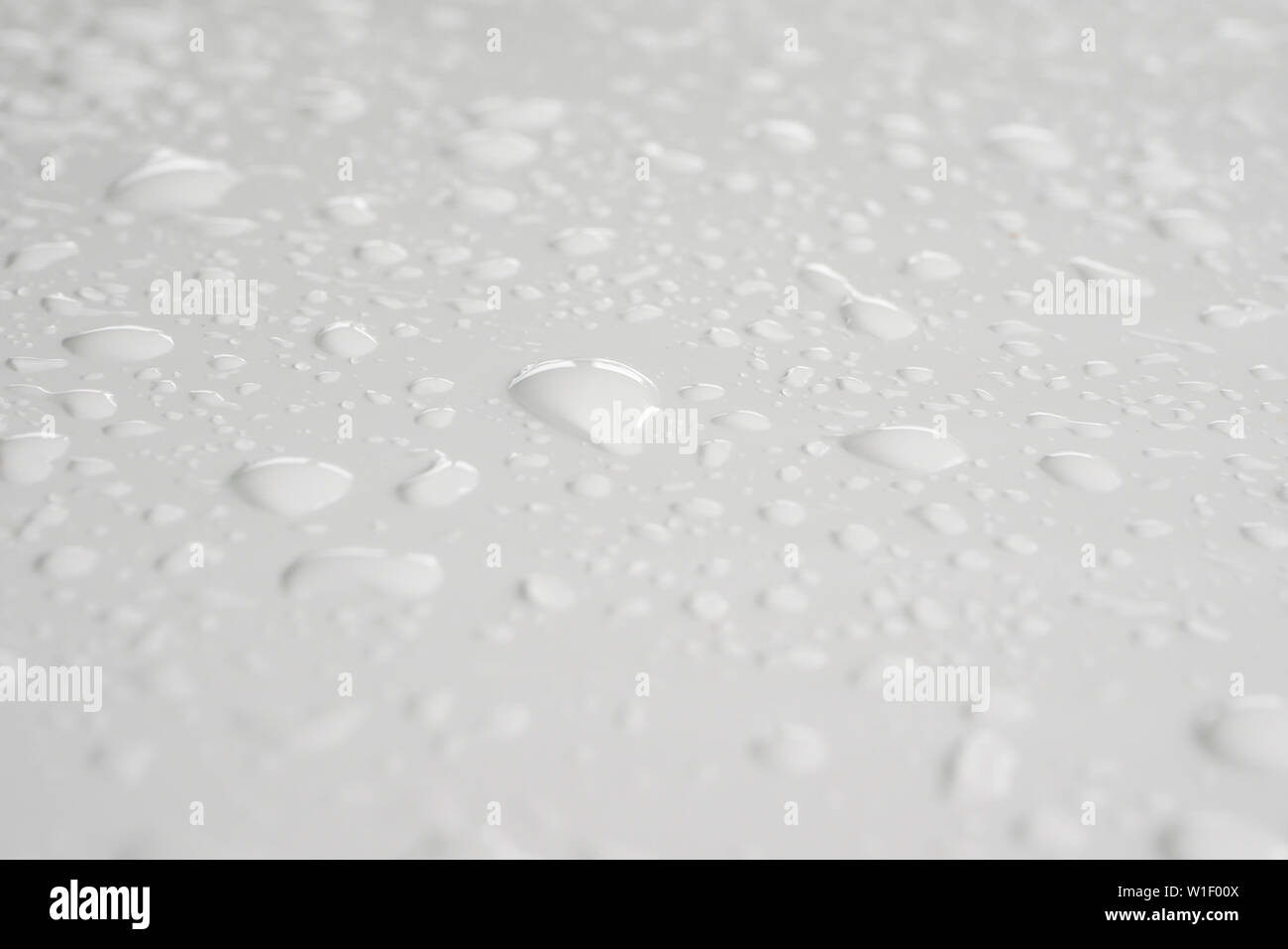 water drop on white background drops of rain on car Stock Photo - Alamy