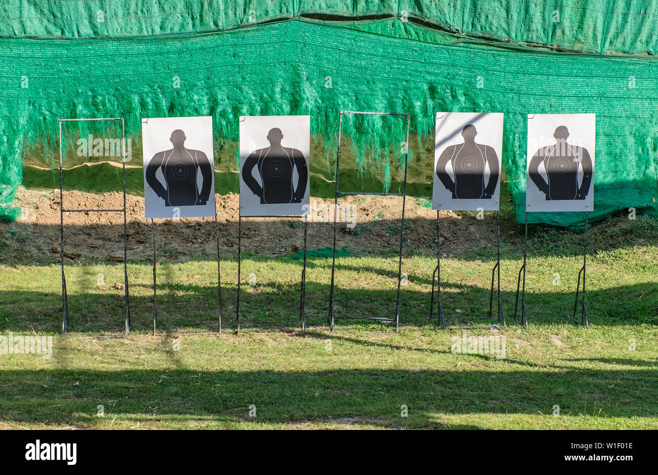Mock human aim target in shooting gallery Stock Photo - Alamy