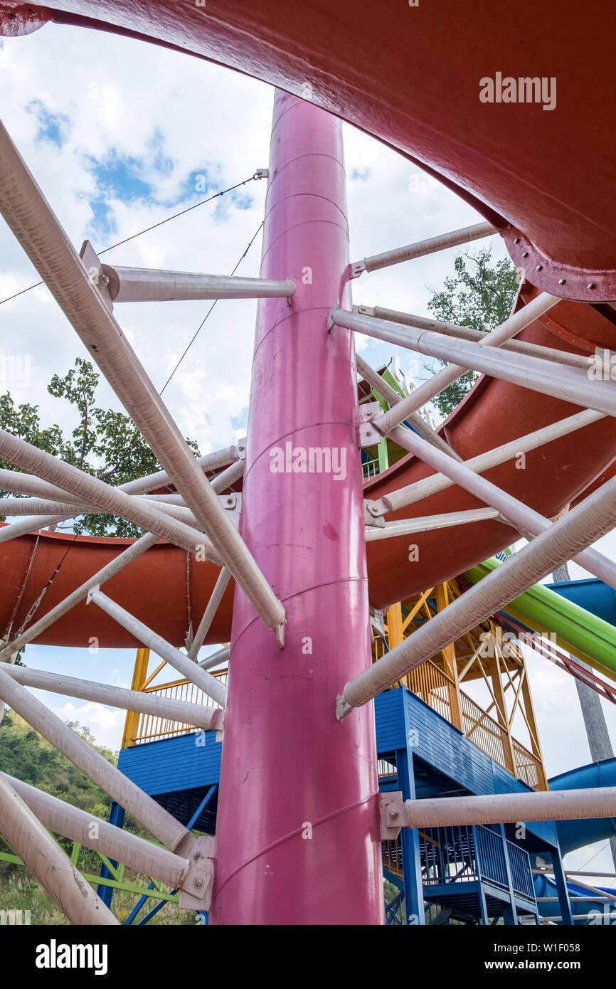 Building structure large pole link slider in water park Stock Photo - Alamy