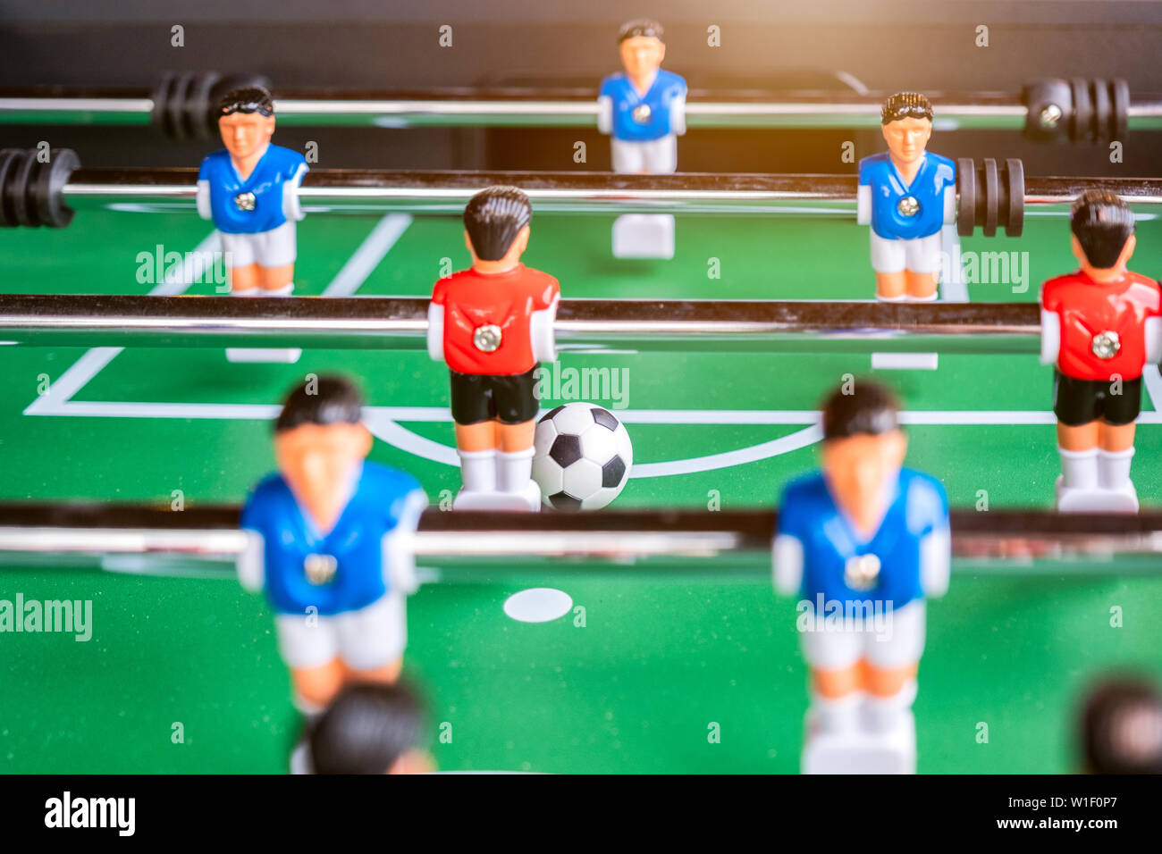 Hand and foosball table hi-res stock photography and images - Alamy