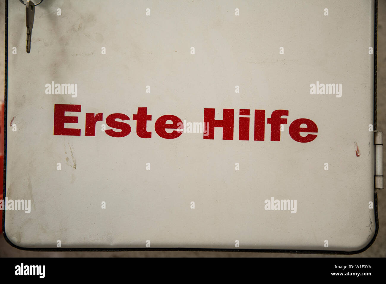 First aid kit on factory wall Stock Photo - Alamy