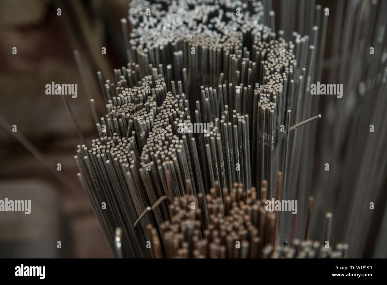 group of metal rods inside container. close-up Stock Photo - Alamy