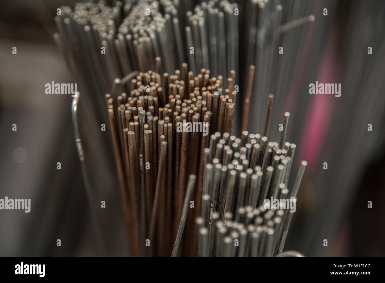 group of metal rods inside container. close-up Stock Photo - Alamy