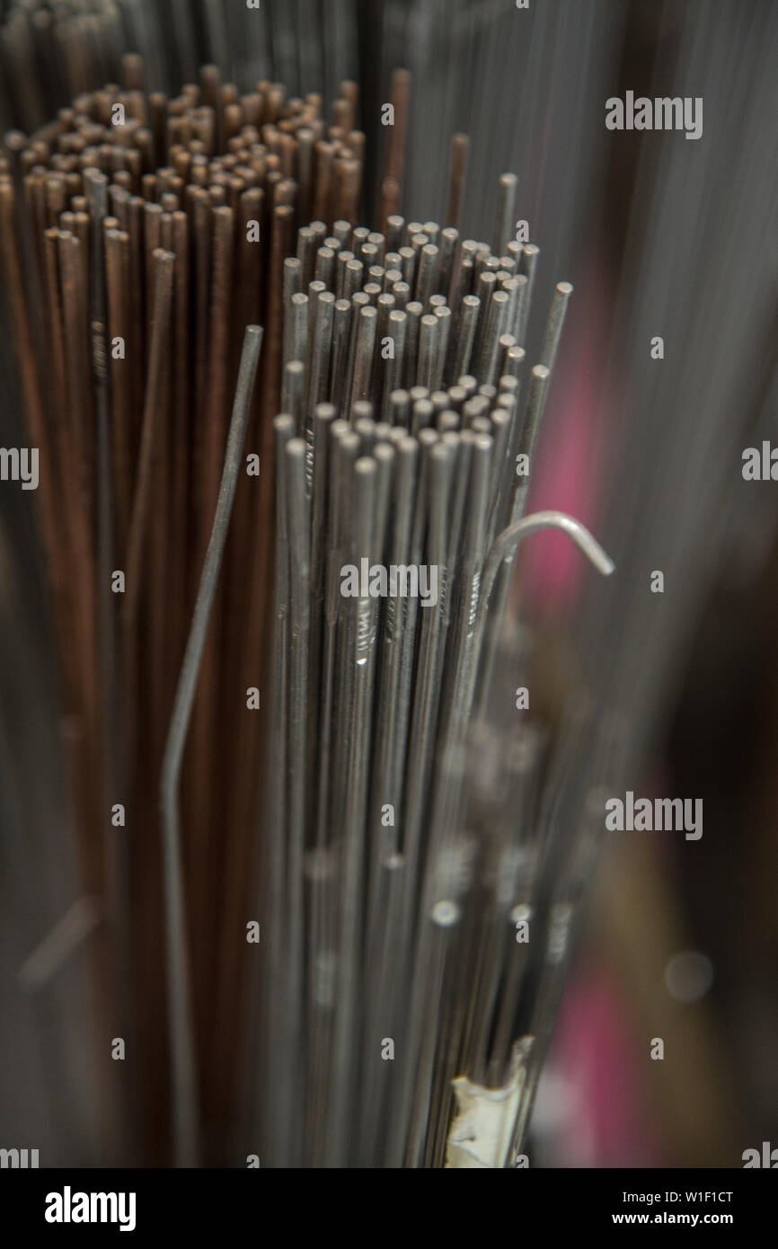 group of metal rods inside container. close-up Stock Photo - Alamy