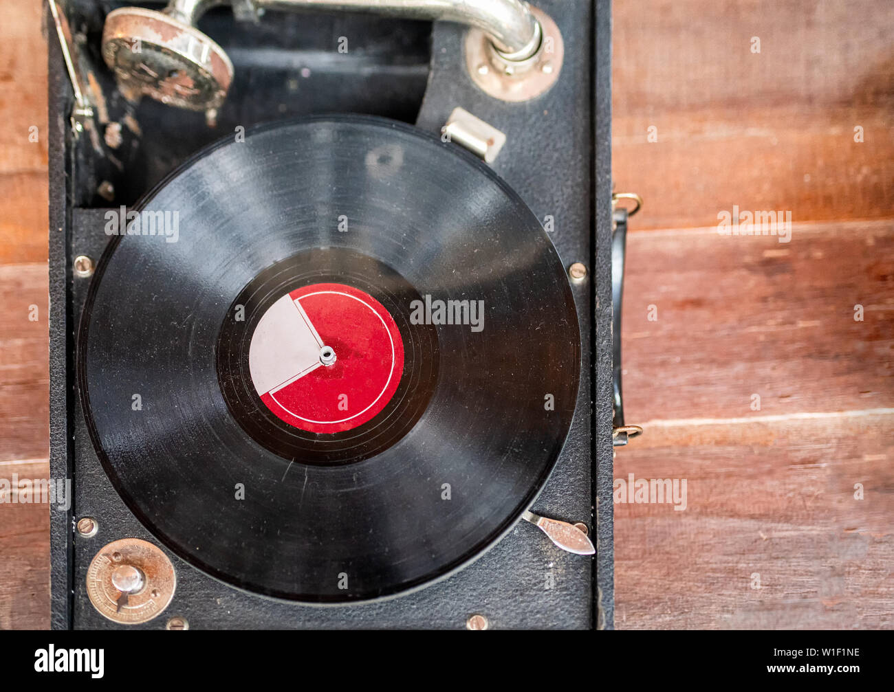 Obsolete retro vinyl record disk player in old box Stock Photo - Alamy