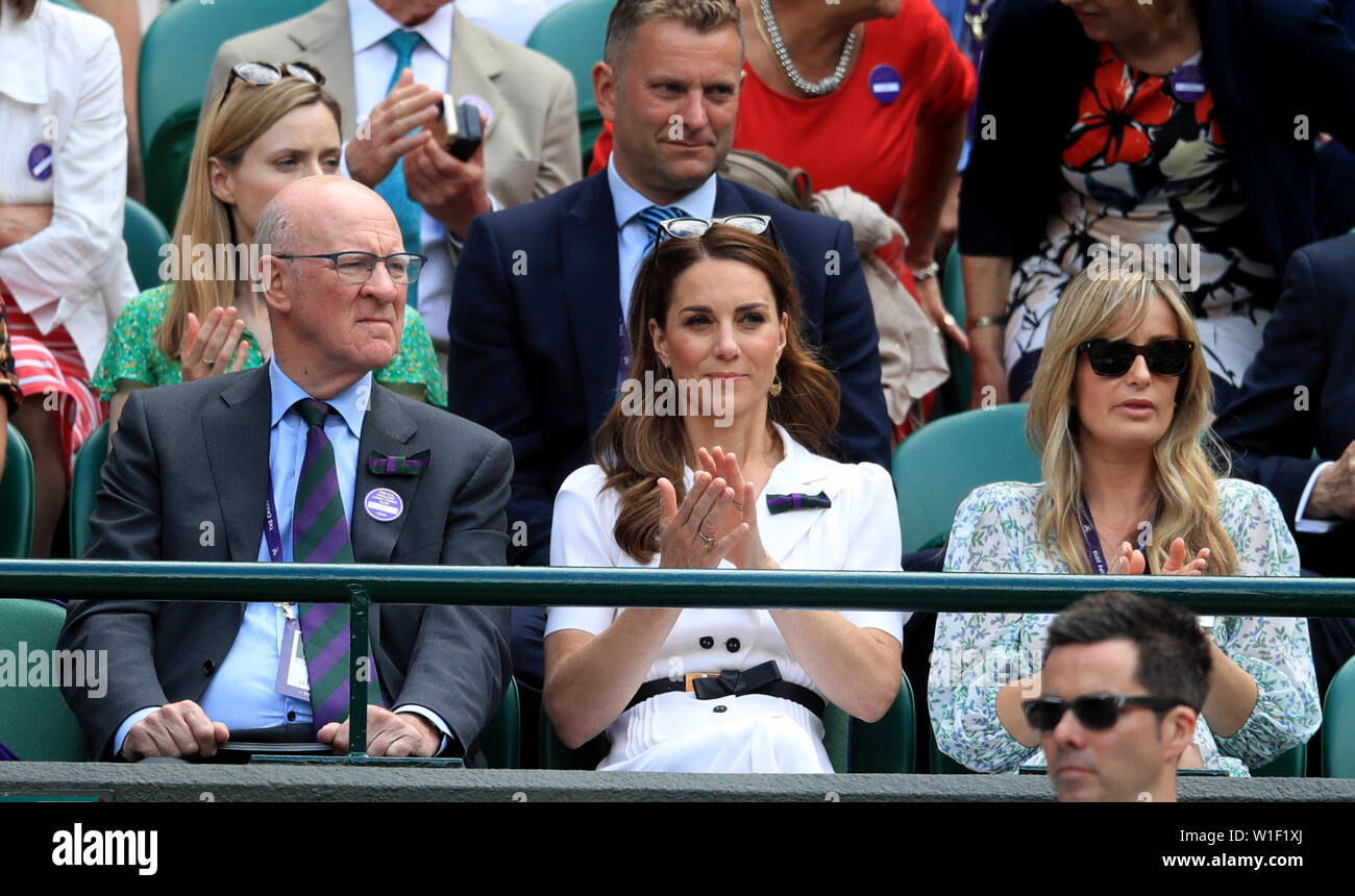 The Duchess of Cambridge watches the action on court one withThe AELTC ...